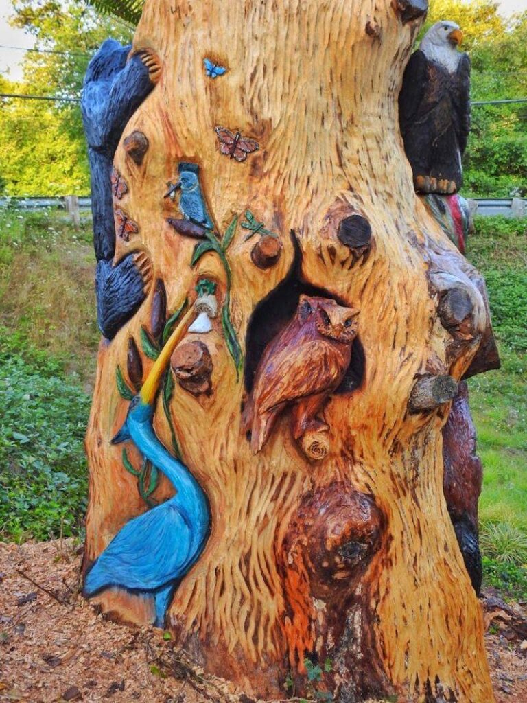 This Whimsical Oregon Forest Is Home To Over 100 Hand-Painted Tree Carvings