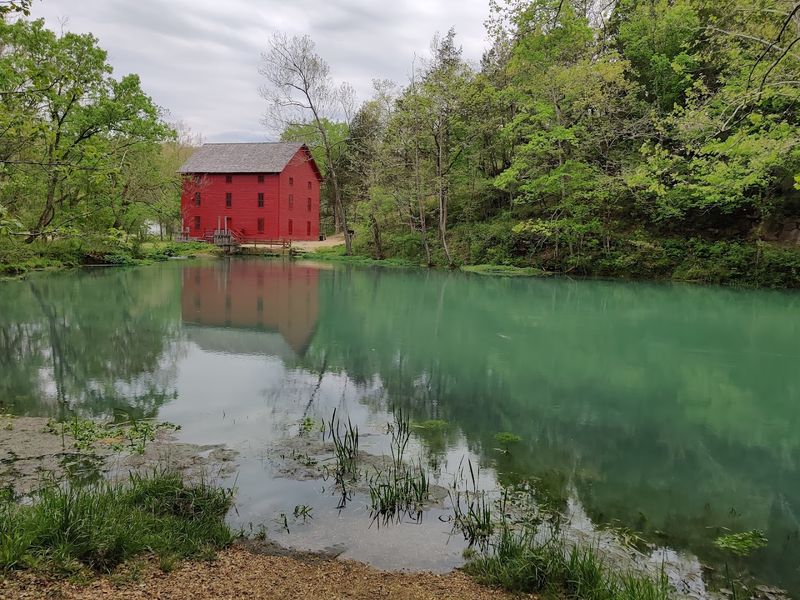 This Fairytale Missouri Red Mill Sits on a Glowing Turquoise Lake Fed ...